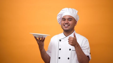 Smiling Man Chef Showing White Empty Stock Footage Video (100% Royalty ...