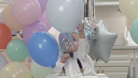 Happy Baby Boy Playing Helium Balloons Stock Footage Video (100% ...