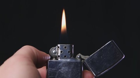 Lighter Being Lit On Black Background Stock Footage Video (100% Royalty ...