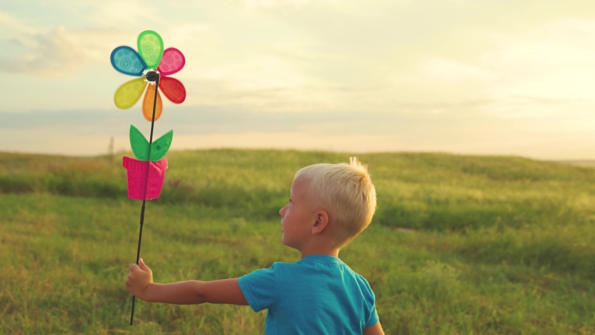 little kid boy runs toy wind Stock Footage Video (100% Royalty-free ...