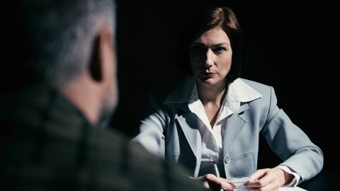 Female Detective Questioning Man Custody About Stock Footage Video (100 ...