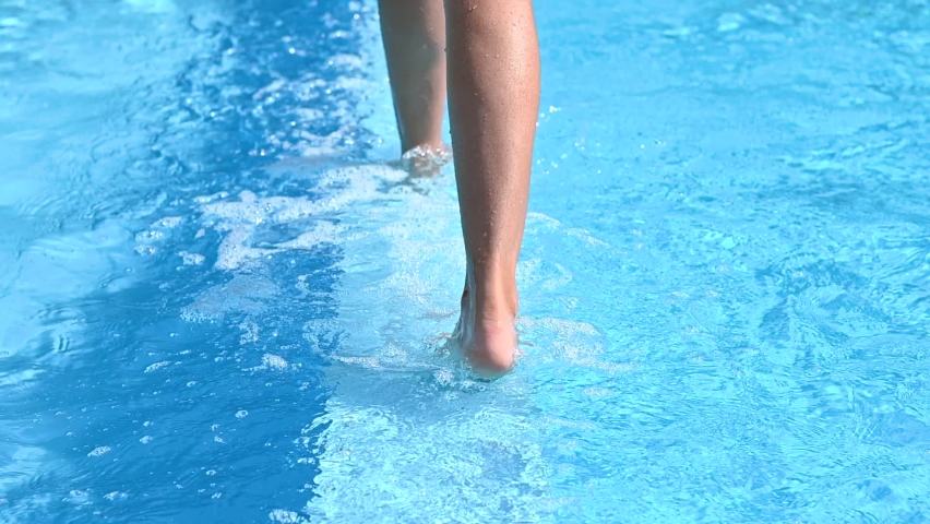 young female legs shaking feet pool Stock Footage Video (100% Royalty ...
