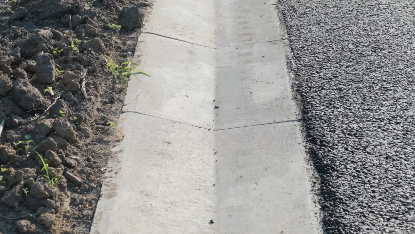 asphalt road stormwater on side ditch Stock Footage Video (100% Royalty ...