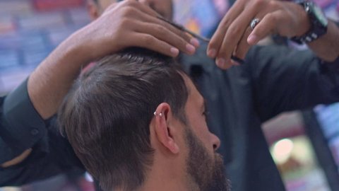 Young Arab Barber Cuts Mans Hair Stock Footage Video (100% Royalty-free ...