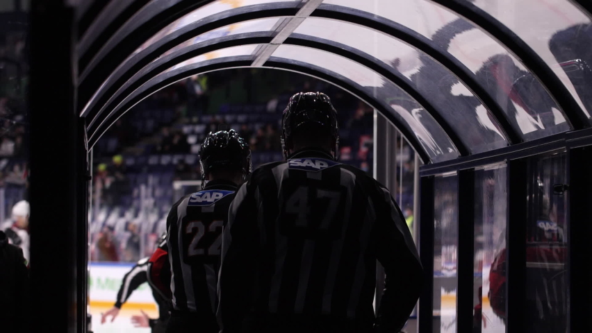 referees group hardhats skates entering ice Stock Footage Video (100% ...