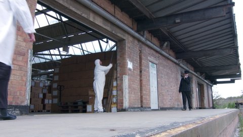 Security Guard Checking Pharmaceutical Lab Warehouse Stock Footage ...