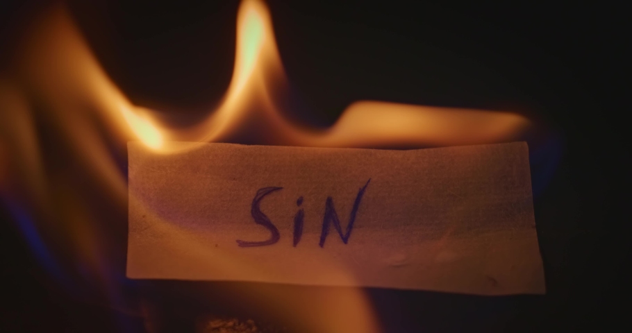 closeup video burning paper sin written Stock Footage Video (100% ...