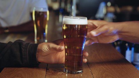 Bartender Handing Beer Customer Bar Counter Stock Footage Video (100% ...