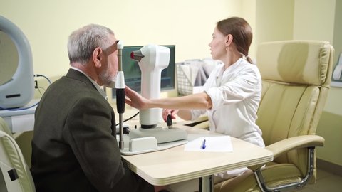 Doctor Interviews Elderly Man Before Being Stock Footage Video (100% ...