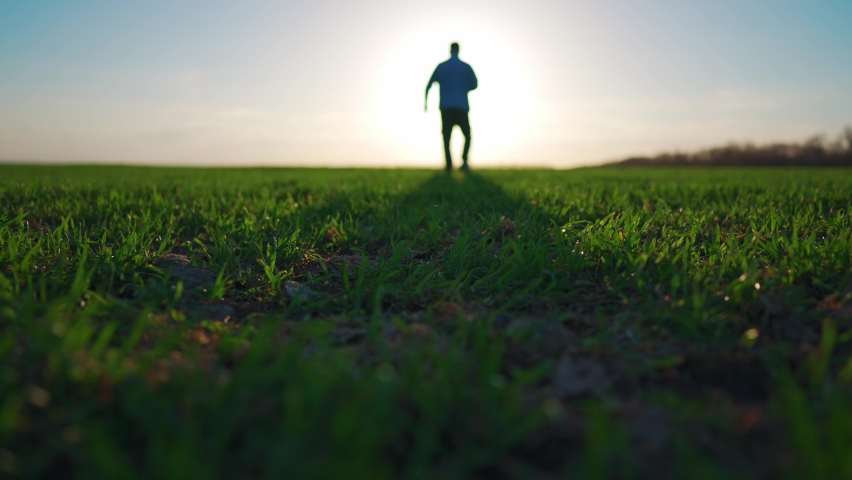 silhouette man walking into distance sunset Stock Footage Video (100% ...