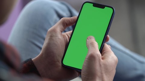 Man Using Smartphone Vertical Mode Green Stock Footage Video (100% Royalty-free) 1089511103 ...