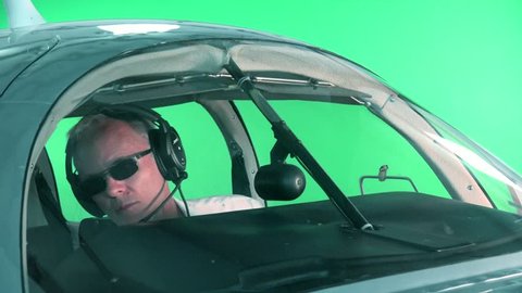 Pilot Flying Airplane Green Screen Background Stock Footage Video (100% ...