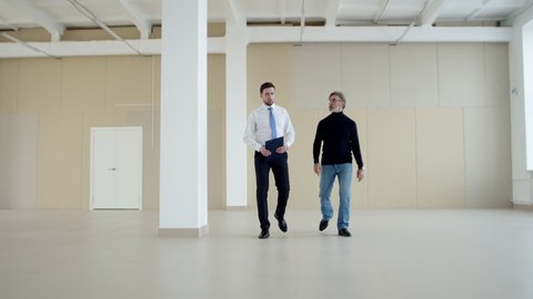 Businessman Manager Walk Around Empty Warehouse Stock Footage Video ...