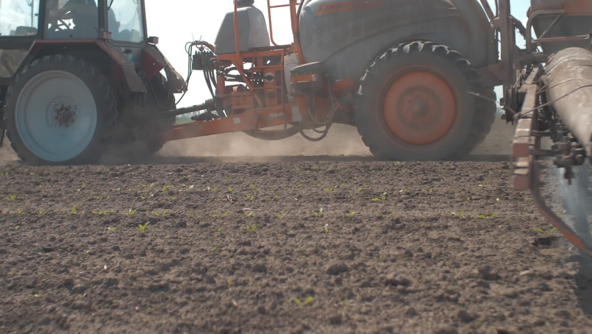 tractor spraying ripening plants sugar beet Stock Footage Video (100% ...