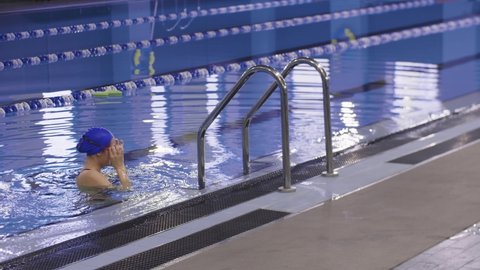 Young Woman Swimmer Exits Pool Using Stock Footage Video (100% Royalty ...