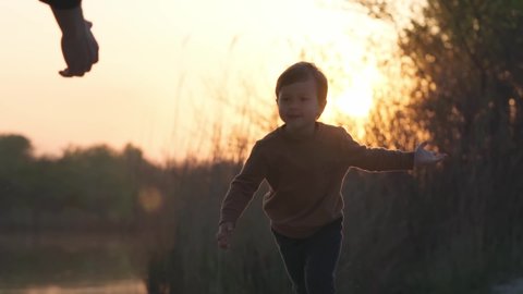 Cute Kid Runs His Father On Stock Footage Video (100% Royalty-free ...