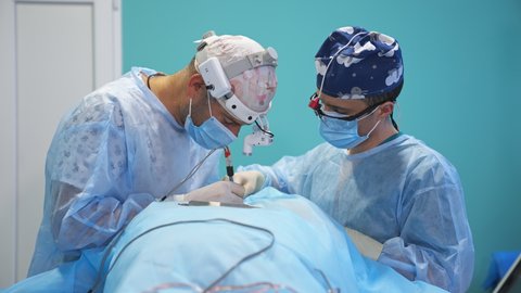 Cardiac surgery professionals Stock Video Footage - 4K and HD Video ...