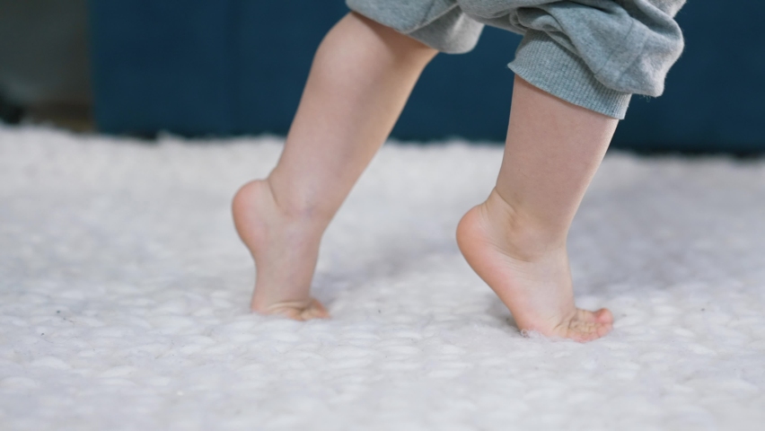 feet baby learns walk first steps Stock Footage Video (100% Royalty ...