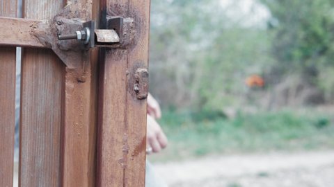 Woman Closing Lock On Gate Stock Footage Video (100% Royalty-free ...