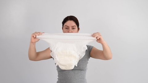 Caucasian Woman Holds Adult Diaper Checks Stock Footage Video (100% ...