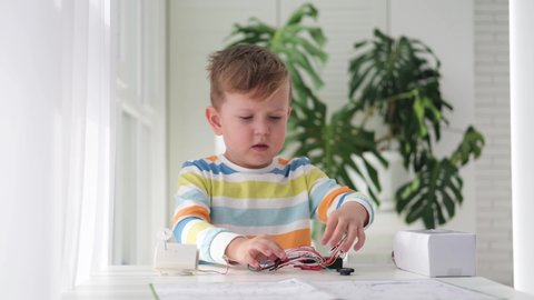Little Boy Performing Studying Science Wires Stock Footage Video (100% ...