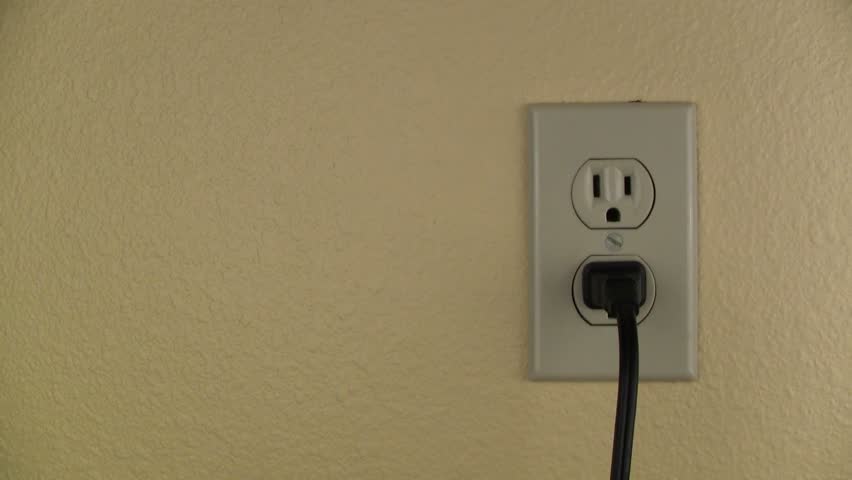unplugging cord outlet save electrical energy Stock Footage Video (100% ...