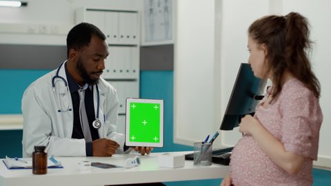 Male Doctor Showing Tablet Greenscreen On Stock Footage Video (100% ...