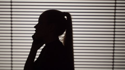 Shadow Woman Talking On Phone Closeup Stock Footage Video (100% Royalty ...