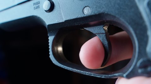 Closeup Finger Pulls Trigger Gun Use Stock Footage Video (100% Royalty ...