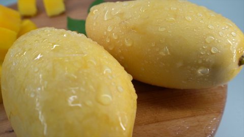 Ripe Mango Juicy Yellow Sliced Spinning Stock Footage Video (100% ...
