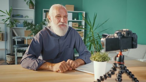 Progressive Older Vlogger Man Recording On Stock Footage Video (100% ...