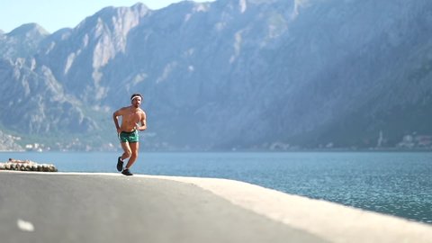 Sporty Man On Run By Water Stock Footage Video (100% Royalty-free ...