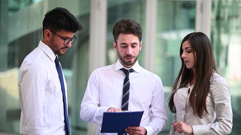 Business People Reading Document Together Stock Footage Video (100% ...