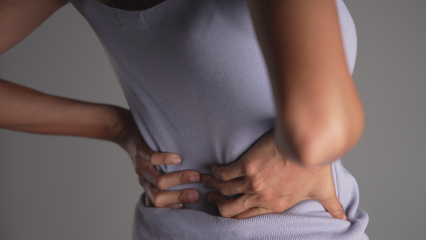 Woman Back Pain Stock Footage ~ Royalty Free Stock Videos | Pond5