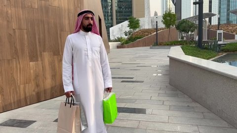 Saudi Arab Man Shopping Outdoors Wearing Stock Footage Video (100% ...