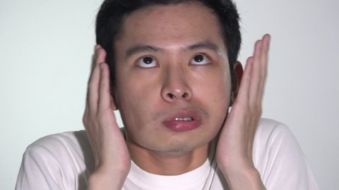 Goofy Asian Man Making Funny Faces Stock Footage Video (100% Royalty ...