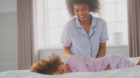 Family Two Mums Wearing Pyjamas Playing Stock Footage Video (100% ...