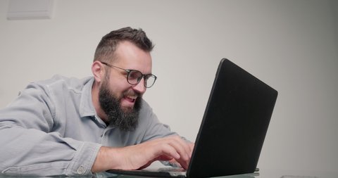 Emotional Man Hits Keyboard Laptop Trying Stock Footage Video (100% ...