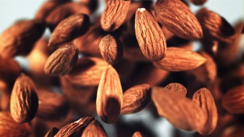Almonds Rise Fall Down On Blue Stock Footage Video (100% Royalty-free ...