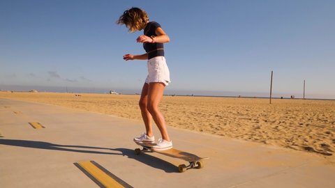 Young Woman Falling Longboard Riding Beach Stock Footage Video (100% ...