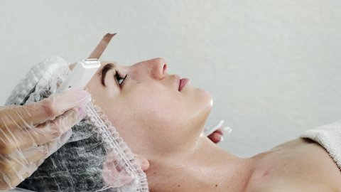 Ultrasonic Scrabbing Young Woman Receiving Ultrasound Stock Footage ...