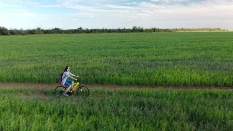 4k Birdseye View Young Woman Rides Stock Footage Video (100% Royalty ...