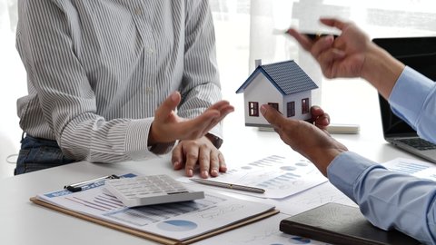 Discussing Real Estate People House Model Stock Footage Video (100% ...