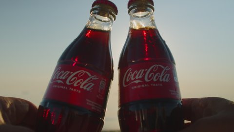 Cocacola Bottles On Sandy Beach On Stock Footage Video (100% Royalty ...