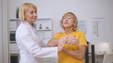Old Woman Pain Doing Rehabilitation Exercises Stock Footage Video (100% ...