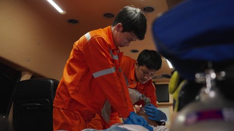 Asian Emergency Medical Technician Emt Paramedic Stock Footage Video ...