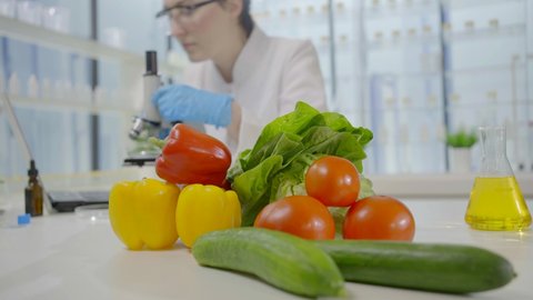 Fresh Vegetables Laboratory Against Background Scientist Stock Footage ...
