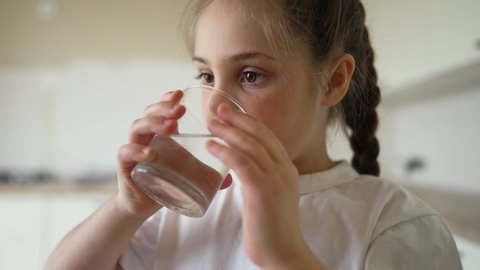 Child Kitchen Smiles Drinks Clean Water Stock Footage Video (100% ...