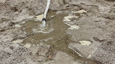 Sand Absorbs Water After Backfilling Trench Stock Footage Video (100% ...
