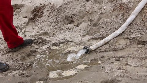 Sand Absorbs Water After Backfilling Trench Stock Footage Video (100% ...